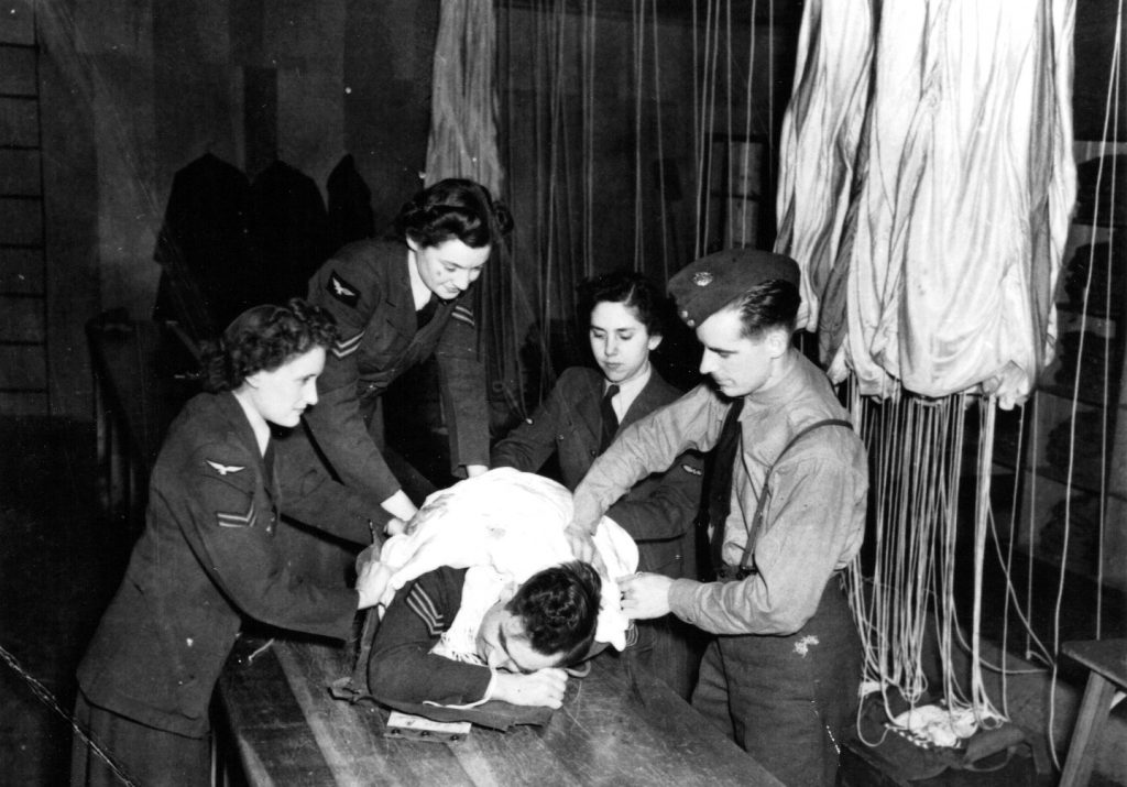 Women worked in the parachute packing and checking department | Wings ...